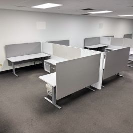 Used Teknion 4-Pack Height Adjustable Desk with Powered Partition Wall ...